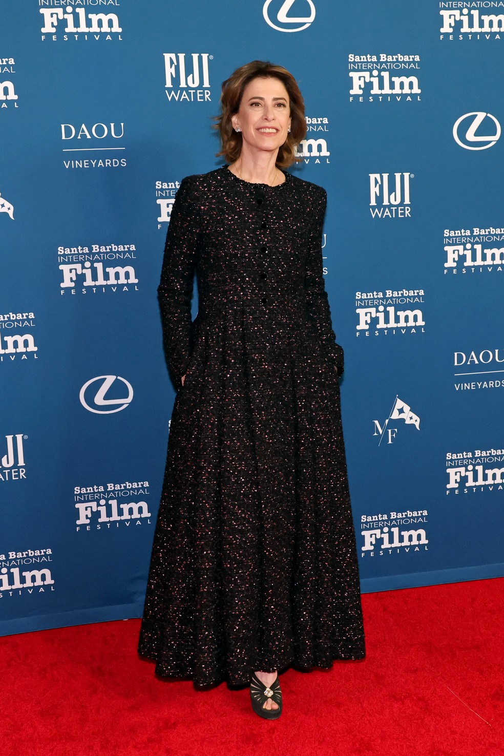 Os looks de Fernanda Torres na divulgação de 'Ainda Estou Aqui'