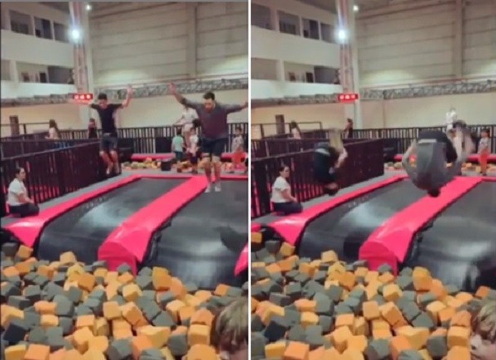 Felipe Titto se diverte com o filho de 15 anos em parque de trampolins